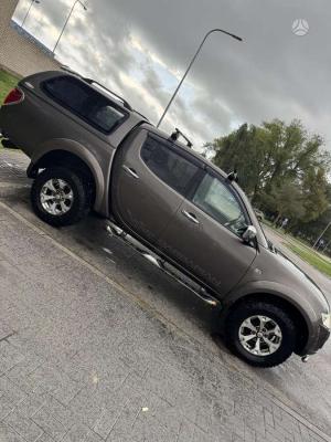 Brown Mitsubishi l-200 2013 in Silute, with an engine capacity of 2.50 L and mileage of 130 thousand km for 5800 €, photo 3 on AUTOMOTO.COM.LV