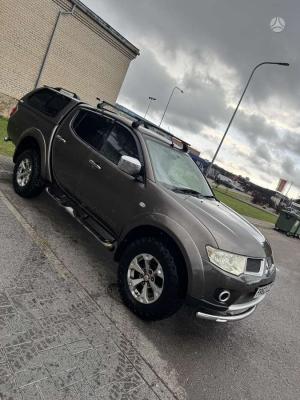 Brown Mitsubishi l-200 2013 in Silute, with an engine capacity of 2.50 L and mileage of 130 thousand km for 5800 €, photo 6 on AUTOMOTO.COM.LV