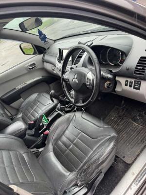 Brown Mitsubishi l-200 2013 in Silute, with an engine capacity of 2.50 L and mileage of 130 thousand km for 5800 €, photo 7 on AUTOMOTO.COM.LV