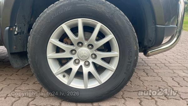 Коричневый Мицубиси Л 200 2014 в Таллин, объемом двигателя 2.50 л и пробегом 232 тыс. км за 13900 €, фото 9 на AUTOMOTO.COM.LV