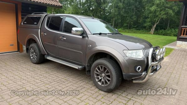 Brown Mitsubishi l-200 2014 in Tallinn, with an engine capacity of 2.50 L and mileage of 232 thousand km for 13800 €, photo 3 on AUTOMOTO.COM.LV