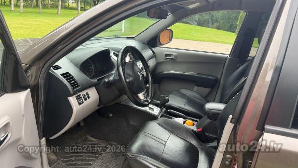 Brown Mitsubishi l-200 2014 in Tallinn, with an engine capacity of 2.50 L and mileage of 232 thousand km for 13800 €, photo 5 on AUTOMOTO.COM.LV