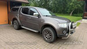 Brown Mitsubishi l-200 2014 in Tallinn, with an engine capacity of 2.50 L and mileage of 232 thousand km for 13900 €, photo 4 on AUTOMOTO.COM.LV