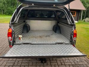 Brown Mitsubishi l-200 2014 in Tallinn, with an engine capacity of 2.50 L and mileage of 232 thousand km for 13900 €, photo 10 on AUTOMOTO.COM.LV