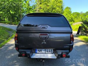 Brown Mitsubishi l-200 2010 in Valka, with an engine capacity of 2.50 L and mileage of 178 thousand km for 12800 €, photo 6 on AUTOMOTO.COM.LV