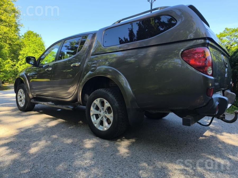 Brown Mitsubishi l-200 2010 in Valka, with an engine capacity of 2.50 L and mileage of 178 thousand km for 12800 €, photo 8 on AUTOMOTO.COM.LV