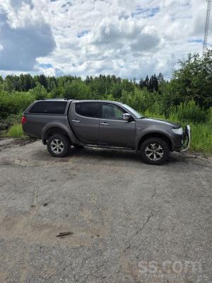 Brown Mitsubishi l-200 2012 in Madona, with an engine capacity of 2.50 L and mileage of 291 thousand km for 4840 €, photo  on AUTOMOTO.COM.LV