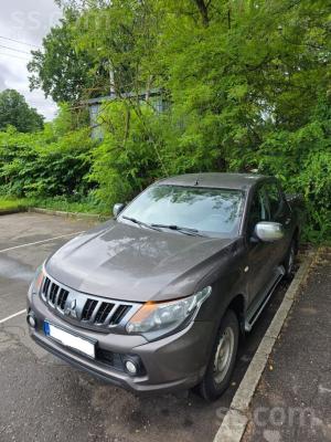 Brūns Mitsubishi l-200 2018 Rīga, ar dzinēja tilpumu 2.40 L un nobraukumu 317 tūkst. km par 9400 €, foto  vietnē AUTOMOTO.COM.LV
