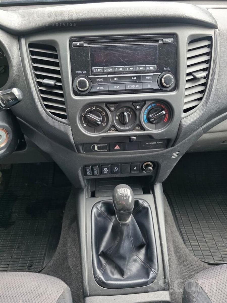 Brown Mitsubishi l-200 2018 in Riga, with an engine capacity of 2.40 L and mileage of 317 thousand km for 9400 €, photo 10 on AUTOMOTO.COM.LV