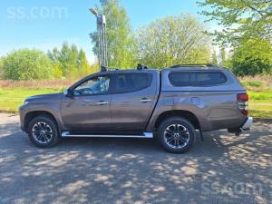 Brown Mitsubishi l-200 2019 in Riga, with an engine capacity of 2.30 L and mileage of 47 thousand km for 23200 €, photo 8 on AUTOMOTO.COM.LV