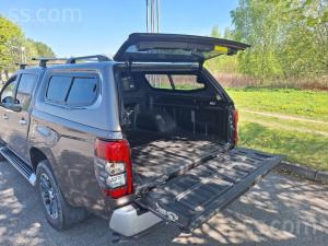 Brown Mitsubishi l-200 2019 in Riga, with an engine capacity of 2.30 L and mileage of 47 thousand km for 23200 €, photo 10 on AUTOMOTO.COM.LV