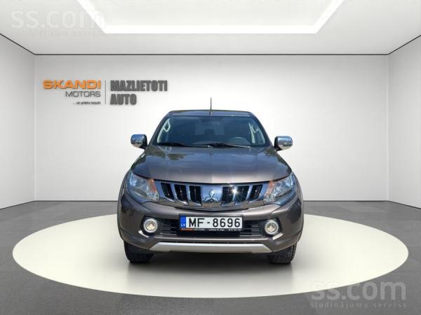 Brown Mitsubishi l-200 2019 in Riga, with an engine capacity of 2.40 L and mileage of 228 thousand km for 18990 €, photo 2 on AUTOMOTO.COM.LV