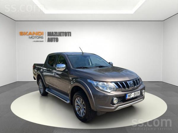 Brown Mitsubishi l-200 2019 in Riga, with an engine capacity of 2.40 L and mileage of 228 thousand km for 18990 €, photo 8 on AUTOMOTO.COM.LV