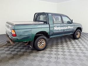Green Mitsubishi l-200 1997 in Tallinn, with an engine capacity of 2.50 L and mileage of 284 thousand km for 1299 €, photo 4 on AUTOMOTO.COM.LV