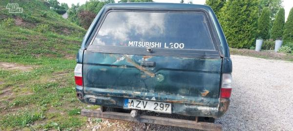 Green Mitsubishi l-200 2005 in Ignalina, with an engine capacity of 2.50 L and mileage of 249 thousand km for 4950 €, photo 6 on AUTOMOTO.COM.LV