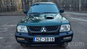 Green Mitsubishi l-200 2005 in Riga, with an engine capacity of 2.50 L and mileage of 0 thousand km for 3800 €, photo 14 on AUTOMOTO.COM.LV