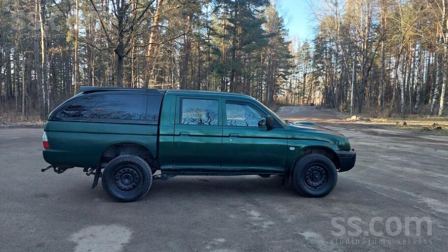Green Mitsubishi l-200 2005 in Riga, with an engine capacity of 2.50 L and mileage of 0 thousand km for 3800 €, photo 25 on AUTOMOTO.COM.LV
