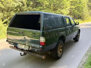 Zaļš Mitsubishi l-200 2006 Viļņa, ar dzinēja tilpumu 2.50 L un nobraukumu 33 tūkst. km par 3500 €, foto 4 vietnē AUTOMOTO.COM.LV