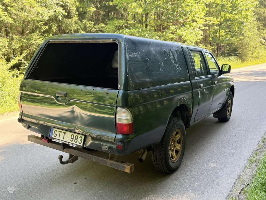 Zaļš Mitsubishi l-200 2006 Viļņa, ar dzinēja tilpumu 2.50 L un nobraukumu 33 tūkst. km par 3500 €, foto 4 vietnē AUTOMOTO.COM.LV
