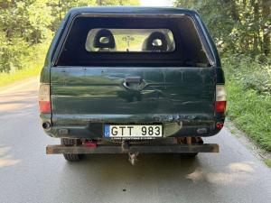 Zaļš Mitsubishi l-200 2006 Viļņa, ar dzinēja tilpumu 2.50 L un nobraukumu 33 tūkst. km par 3500 €, foto 8 vietnē AUTOMOTO.COM.LV