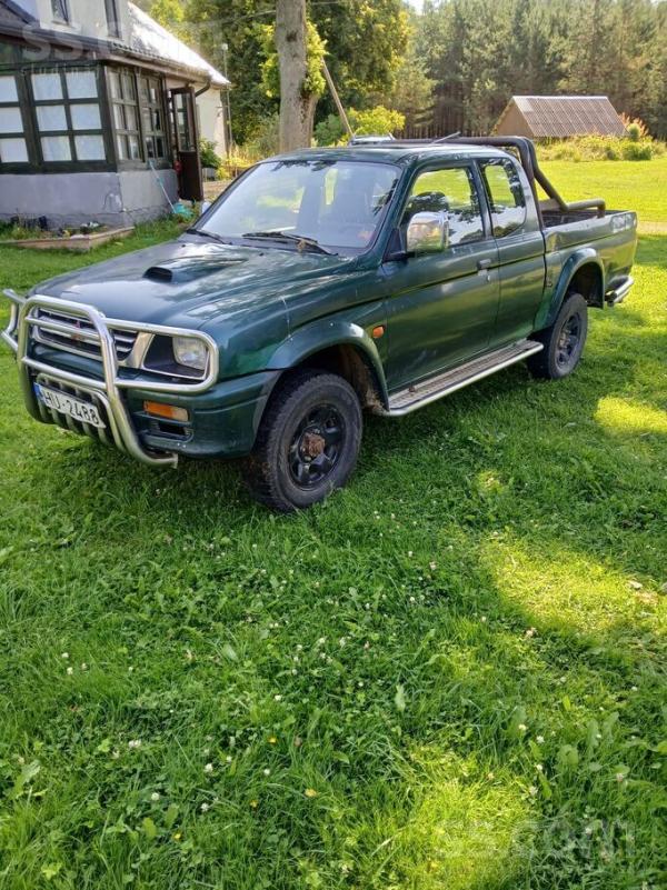 Green Mitsubishi l-200 1997 in Kuldiga, with an engine capacity of 2.50 L and mileage of 394 thousand km for 2500 €, photo 2 on AUTOMOTO.COM.LV