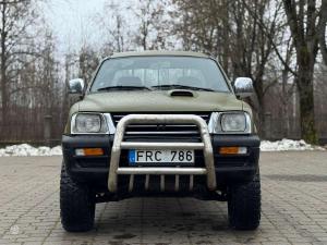 Zaļš Mitsubishi l-200 2000 Viļņa, ar dzinēja tilpumu 2.50 L un nobraukumu 285 tūkst. km par 4700 €, foto 2 vietnē AUTOMOTO.COM.LV