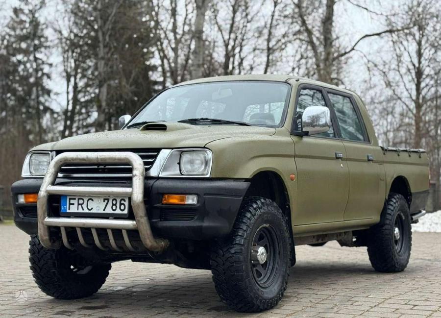 Zaļš Mitsubishi l-200 2000 Viļņa, ar dzinēja tilpumu 2.50 L un nobraukumu 285 tūkst. km par 4700 €, foto 3 vietnē AUTOMOTO.COM.LV