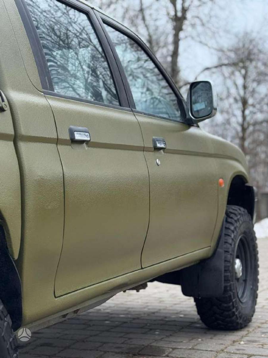 Zaļš Mitsubishi l-200 2000 Viļņa, ar dzinēja tilpumu 2.50 L un nobraukumu 285 tūkst. km par 4700 €, foto 8 vietnē AUTOMOTO.COM.LV