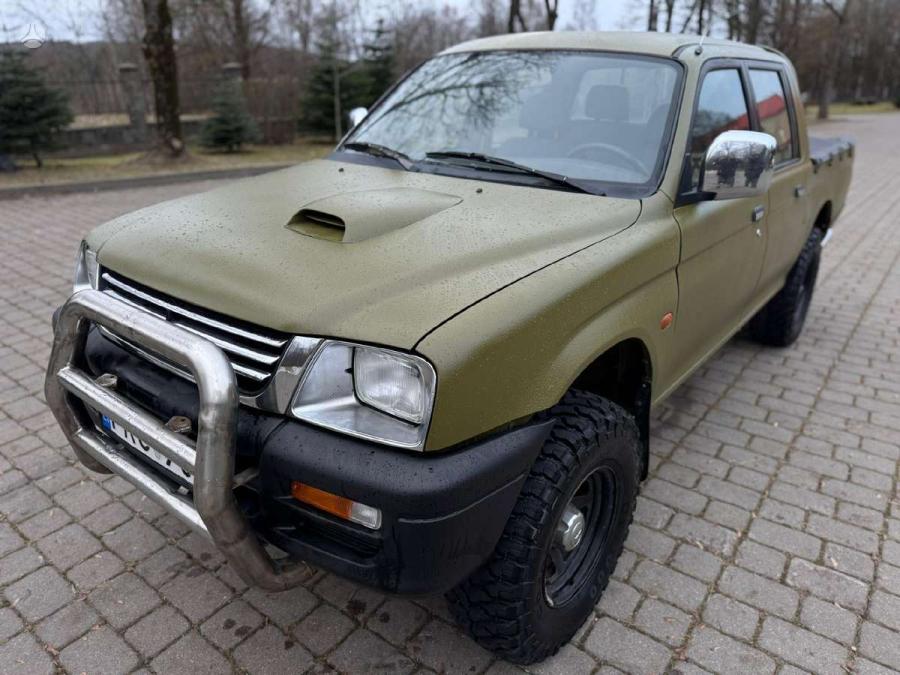 Zaļš Mitsubishi l-200 2000 Viļņa, ar dzinēja tilpumu 2.50 L un nobraukumu 285 tūkst. km par 4700 €, foto 16 vietnē AUTOMOTO.COM.LV