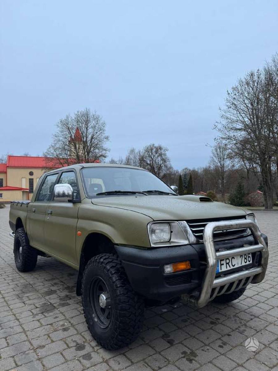 Zaļš Mitsubishi l-200 2000 Viļņa, ar dzinēja tilpumu 2.50 L un nobraukumu 285 tūkst. km par 4700 €, foto 17 vietnē AUTOMOTO.COM.LV