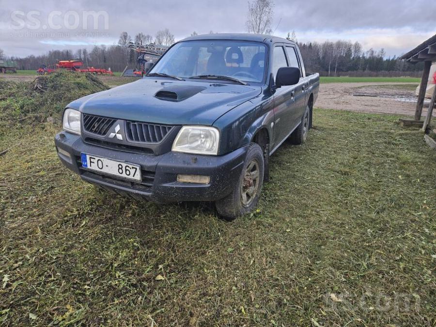Зеленый Мицубиси Л 200 2005 в Екабпилс, объемом двигателя 2.50 л и пробегом 390 тыс. км за 2500 €, фото 1 на AUTOMOTO.COM.LV