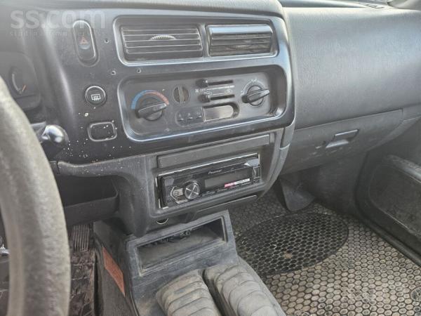 Green Mitsubishi l-200 2005 in Jekabpils, with an engine capacity of 2.50 L and mileage of 390 thousand km for 2500 €, photo 4 on AUTOMOTO.COM.LV