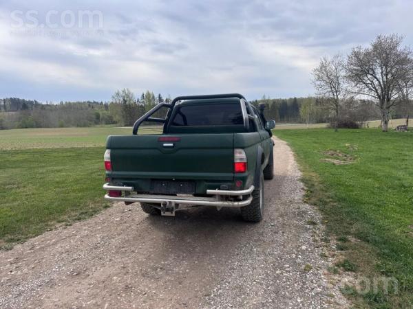 Green Mitsubishi l-200 2005 in Liepaja, with an engine capacity of 2.50 L and mileage of 345 thousand km for 6800 €, photo 4 on AUTOMOTO.COM.LV