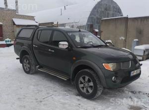 Green Mitsubishi l-200 2008 in Daugavpils, with an engine capacity of 2.40 L and mileage of 313 thousand km for 9680 €, photo  on AUTOMOTO.COM.LV