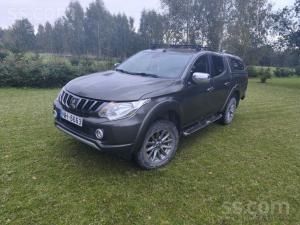 Green Mitsubishi l-200 2017 in Jelgava, with an engine capacity of 2.40 L and mileage of 171 thousand km for 10000 €, photo 5 on AUTOMOTO.COM.LV
