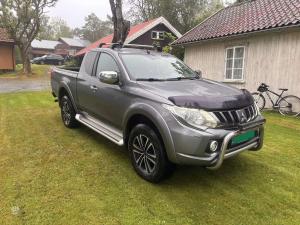 Green Mitsubishi l-200 2019 in Vilnius, with an engine capacity of 2.44 L and mileage of 263 thousand km for 13000 €, photo 4 on AUTOMOTO.COM.LV