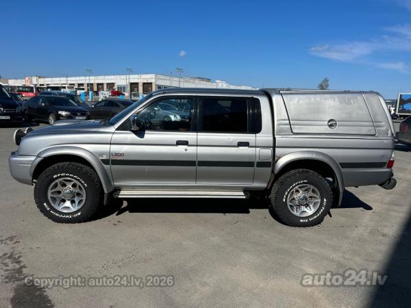 Grey Mitsubishi l-200 2001 in Tartu, with an engine capacity of 2.50 L and mileage of 190 thousand km for 2999 €, photo 6 on AUTOMOTO.COM.LV