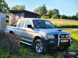 Pelēks Mitsubishi l-200 2004 Liepāja, ar dzinēja tilpumu 2.50 L un nobraukumu 284 tūkst. km par 1400 €, foto  vietnē AUTOMOTO.COM.LV
