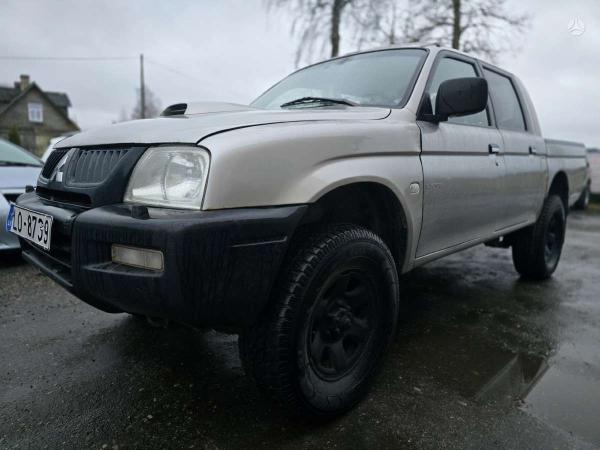 Pelēks Mitsubishi l-200 2005 Rokiškis, ar dzinēja tilpumu 2.50 L un nobraukumu 250 tūkst. km par 3800 €, foto 2 vietnē AUTOMOTO.COM.LV