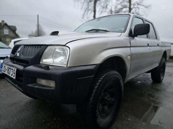 Pelēks Mitsubishi l-200 2005 Rokiškis, ar dzinēja tilpumu 2.50 L un nobraukumu 250 tūkst. km par 3800 €, foto 6 vietnē AUTOMOTO.COM.LV