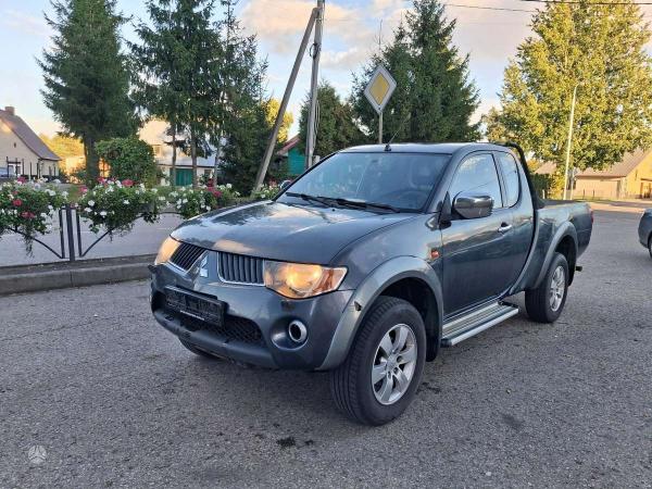 Pelēks Mitsubishi l-200 2006 Raseiniai, ar dzinēja tilpumu 2.48 L un nobraukumu 204 tūkst. km par 3800 €, foto 9 vietnē AUTOMOTO.COM.LV