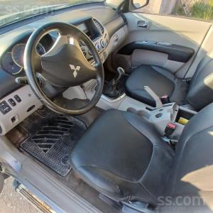 Grey Mitsubishi l-200 2006 in Ventspils, with an engine capacity of 2.50 L and mileage of 301 thousand km for 4500 €, photo 8 on AUTOMOTO.COM.LV