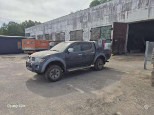 Pelēks Mitsubishi l-200 2007 Raseiniai, ar dzinēja tilpumu 2.50 L un nobraukumu 190 tūkst. km par 4600 €, foto  vietnē AUTOMOTO.COM.LV