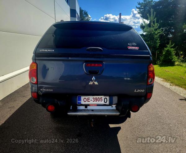 Grey Mitsubishi l-200 2010 in Tallinn, with an engine capacity of 2.50 L and mileage of 370 thousand km for 7500 €, photo 10 on AUTOMOTO.COM.LV