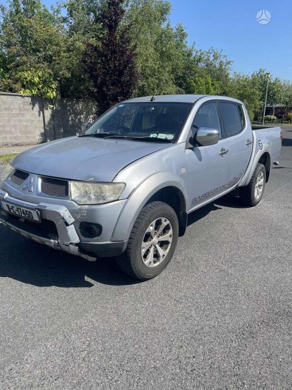 Grey Mitsubishi l-200 2011 in Kaunas, with an engine capacity of 2.50 L and mileage of 278 thousand km for 5300 €, photo 6 on AUTOMOTO.COM.LV