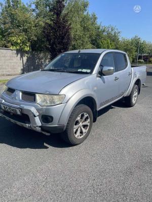 Grey Mitsubishi l-200 2011 in Kaunas, with an engine capacity of 2.50 L and mileage of 278 thousand km for 5300 €, photo 7 on AUTOMOTO.COM.LV