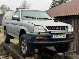 Grey Mitsubishi l-200 2001 in Liepaja, with an engine capacity of 2.50 L and mileage of 270 thousand km for 2500 €, photo 2 on AUTOMOTO.COM.LV