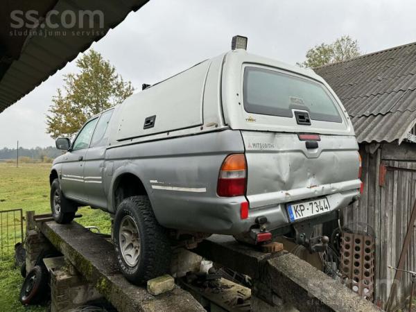 Grey Mitsubishi l-200 2001 in Liepaja, with an engine capacity of 2.50 L and mileage of 270 thousand km for 2500 €, photo 3 on AUTOMOTO.COM.LV