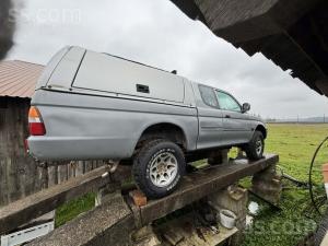 Grey Mitsubishi l-200 2001 in Liepaja, with an engine capacity of 2.50 L and mileage of 270 thousand km for 2500 €, photo 4 on AUTOMOTO.COM.LV