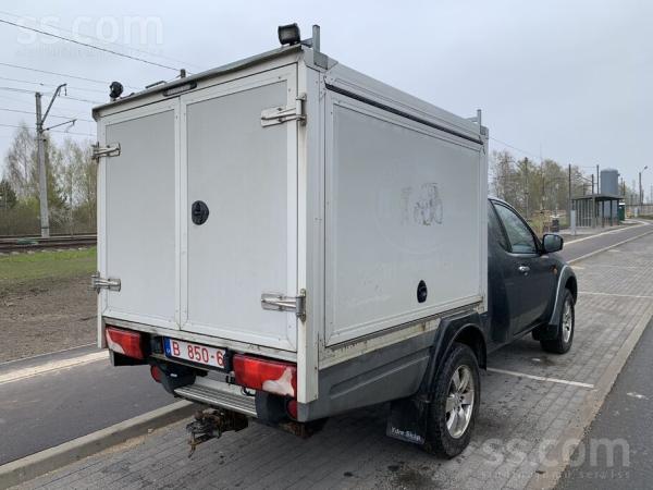 Pelēks Mitsubishi l-200 2006 Rīga, ar dzinēja tilpumu 2.50 L un nobraukumu 366 tūkst. km par 4900 €, foto 8 vietnē AUTOMOTO.COM.LV